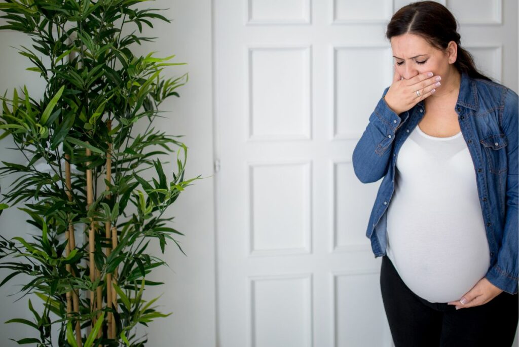 StefaNikolic_Canva Pro_Pregnant woman with nausea - ParentsTogether